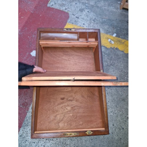 An exquisite Edwardian walnut writing slope featuring brass hardware ...