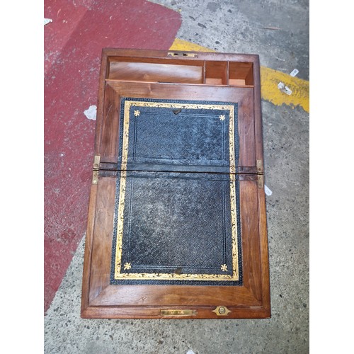 An exquisite Edwardian walnut writing slope featuring brass hardware ...