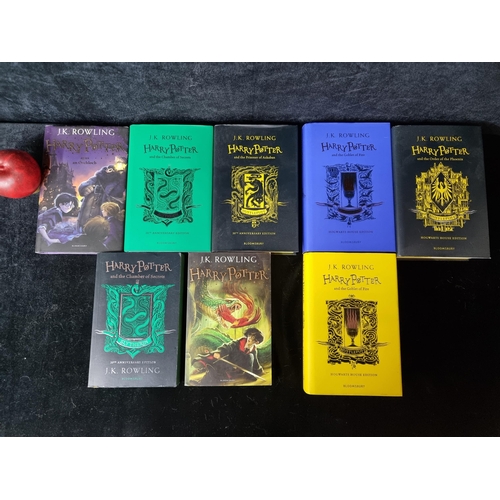 A selection of Harry Potter books. Including five hardback examples ...