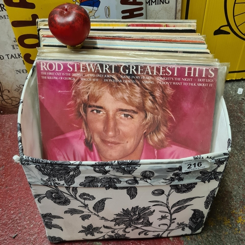 A collection of approximately 36 vinyl records including examples such ...