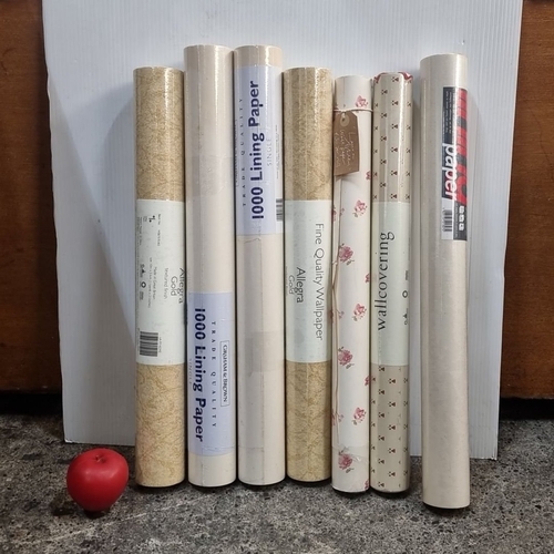 Collection of eight wallpaper and lining paper rolls, including ...