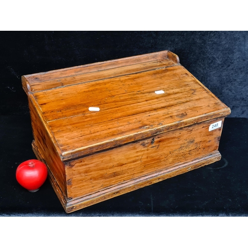An Antique Pine Writing slope with hinge lid and dove tail joiner.