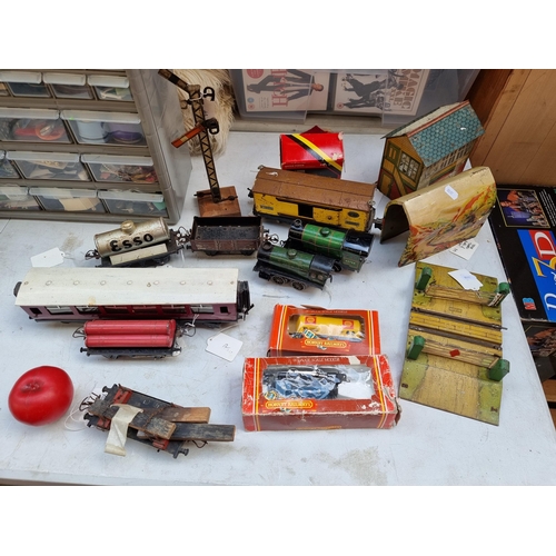 A box full of vintage collectible model trains and accessories ...