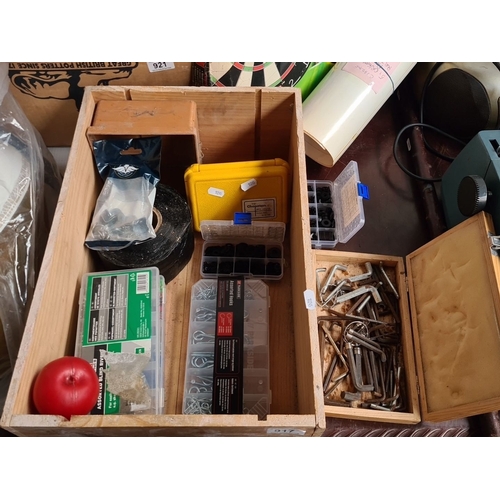 Wooden tray holding Parkside 151-piece assorted hooks set, Powerfix ...