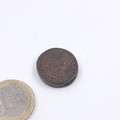 A Portuguese coin weight dated 1746 part of 36 shillings, stamped to coin.