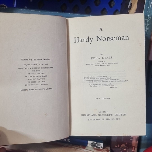 Approximately twenty assorted hardback and paperback books, including ...