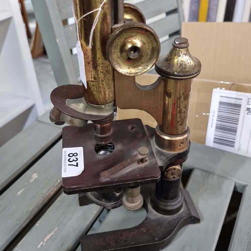 Victorian brass monocular microscope with horseshoe base, circular ...