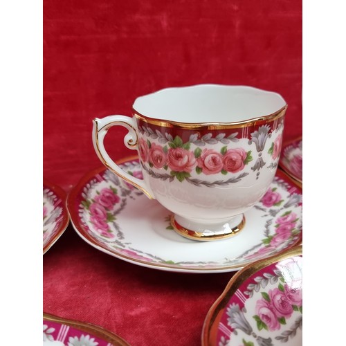 A pretty 18 piece Roslyn fine bone China tea set in the Buckingham Rose ...