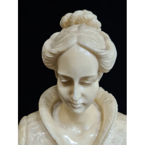 An elegant alabaster composite bust of lady on marble base. After an ...