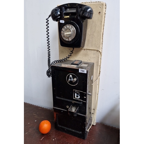 Star Lot: Black Bakelite GPO 332 rotary-dial telephone mounted above ...
