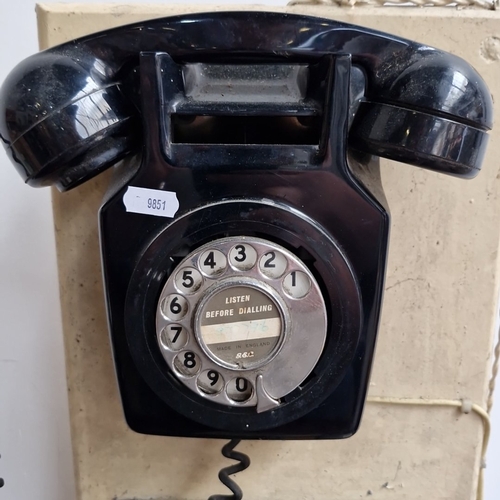 Star Lot: Black Bakelite GPO 332 rotary-dial telephone mounted above ...
