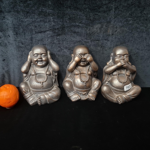 Three Buddha Figurines depicting the three wise monkey's pose ...