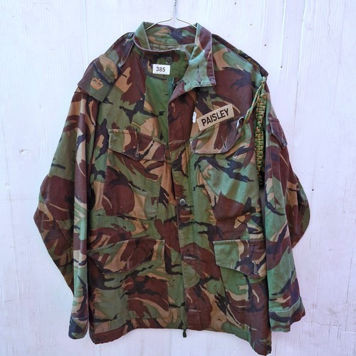 A British Army disruptive pattern material jacket with Swiss Army knife ...