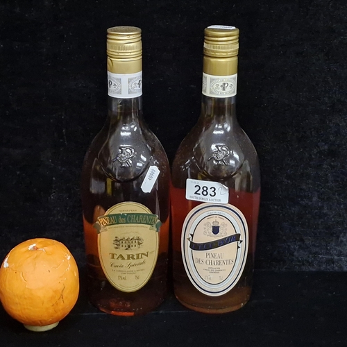 Two sealed 75cl bottles of alcohol including a bottle of Pineau Des ...
