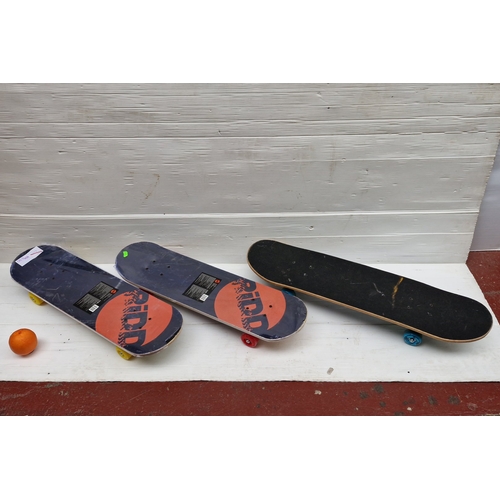 Three brand new Full size skateboards with assorted graphic decks, grip ...