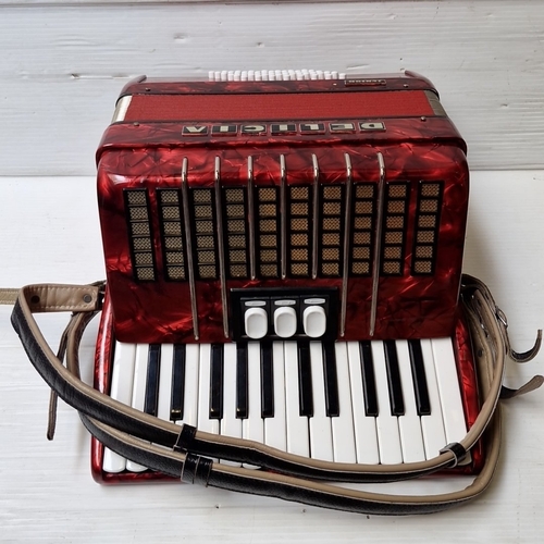Red pearloid Delicia “Junior” piano accordion, three treble registers ...