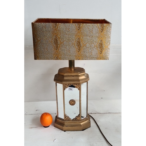 Vintage gilt-metal octagonal table lamp with mirrored panels, applied ...