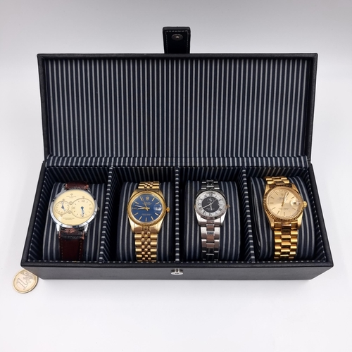 A selection of reproduction watches in a Jasper Conrad watch box.