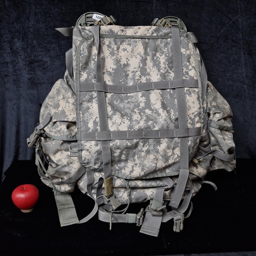 A large Molle II camo modular lightweight loady carrying equipment ...
