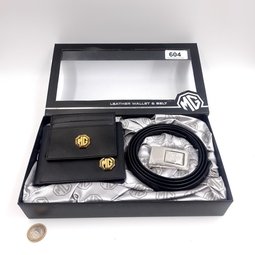 A Presentation MG Gents gift set containing two leather wallets, and a ...