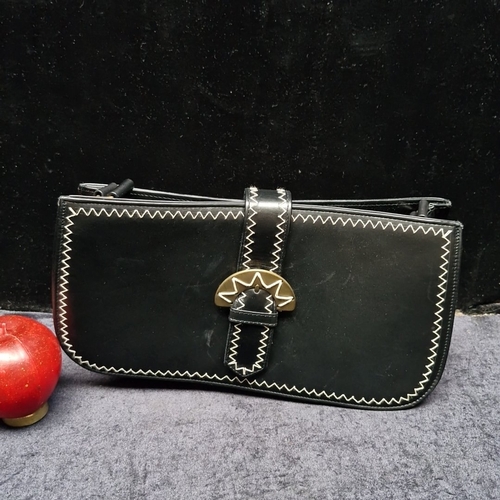 Black leather clutch bag by Lisa Kay, rectangular with white zig-zag ...