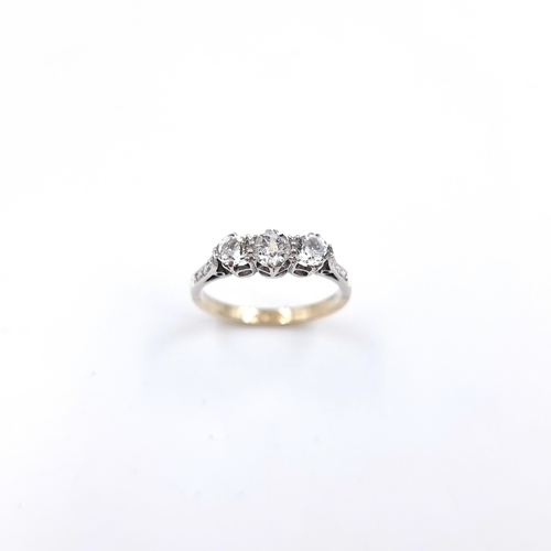 A nine carat gold / Silver gem set ring. Size - O, Weight - 2.1 grams.