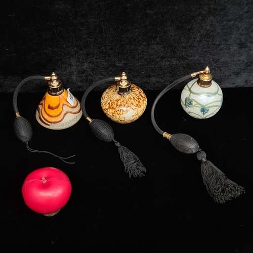 Three very pretty vintage hand painted glass perfume bottles each with ...