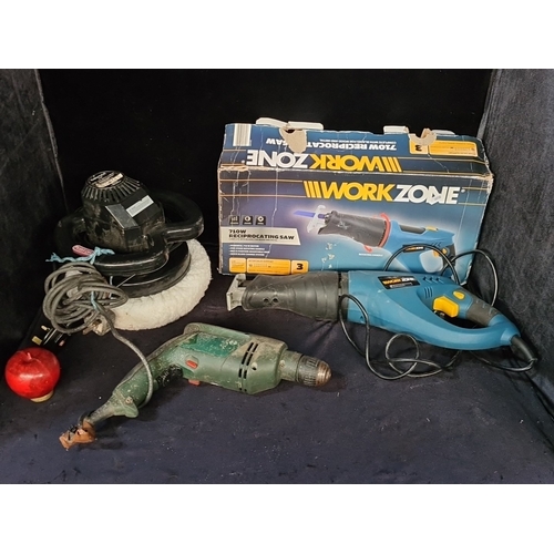 Group of three corded power tools comprising Workzone 710 W ...