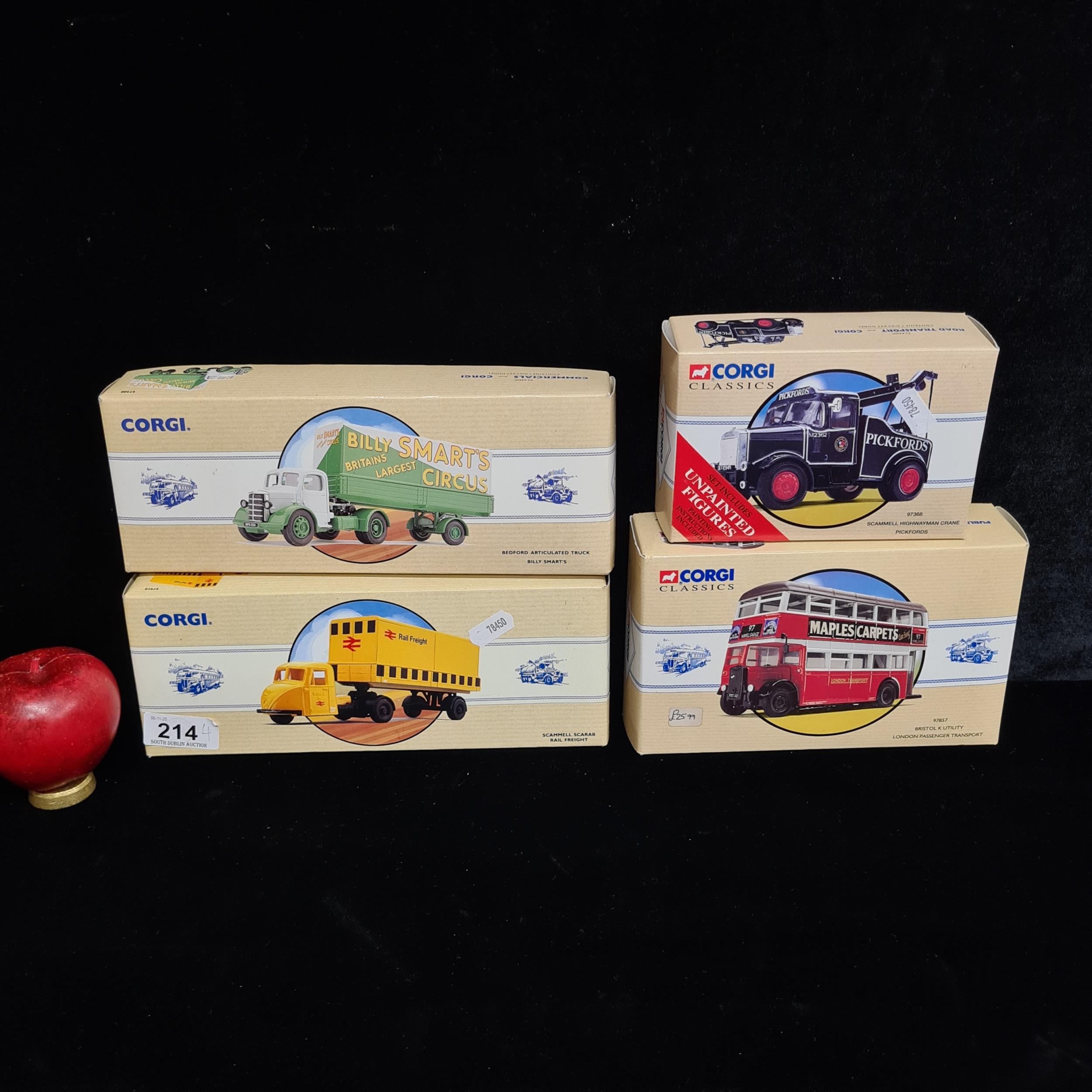 Four, as new in box collectible Corgi model die cast cars. Includes a ...