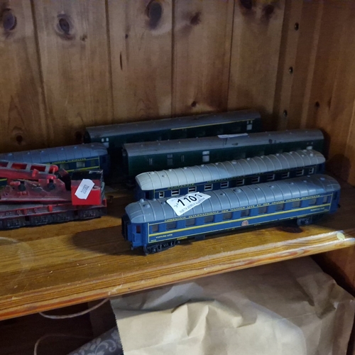 Collection of vintage tinplate O-gauge model railway rolling stock ...