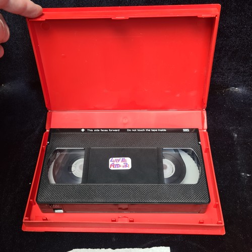 Six home video VHS recordings of the 1985 Live Aid concert. Broken up ...