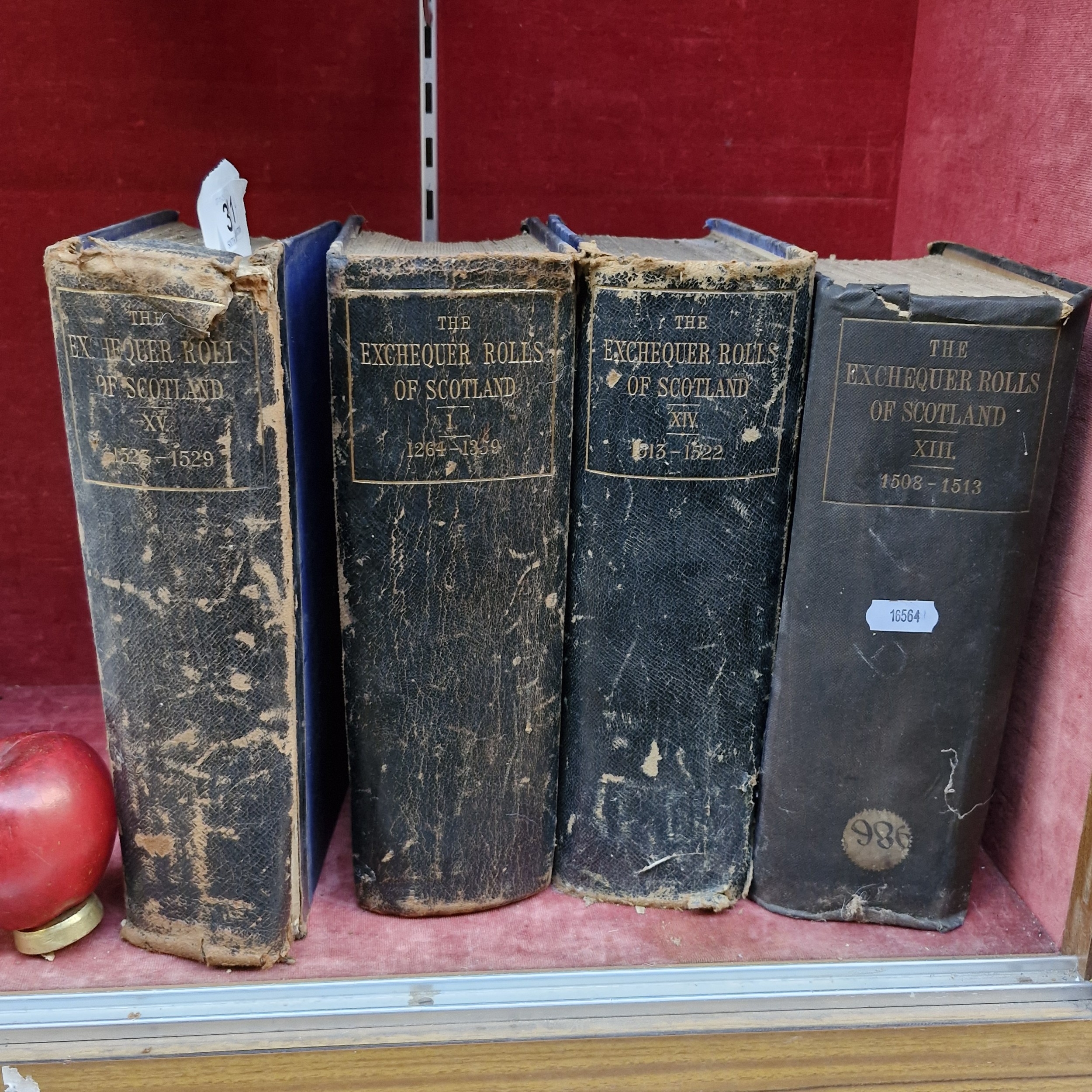 Four antique hardback volumes of the Exchequer Rolls of Scotland ...