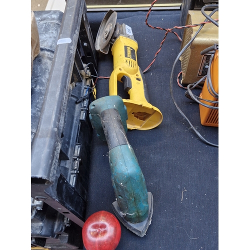A Dewalt DC410 angle grinder tool and Makita 18V corner sander. Both ...