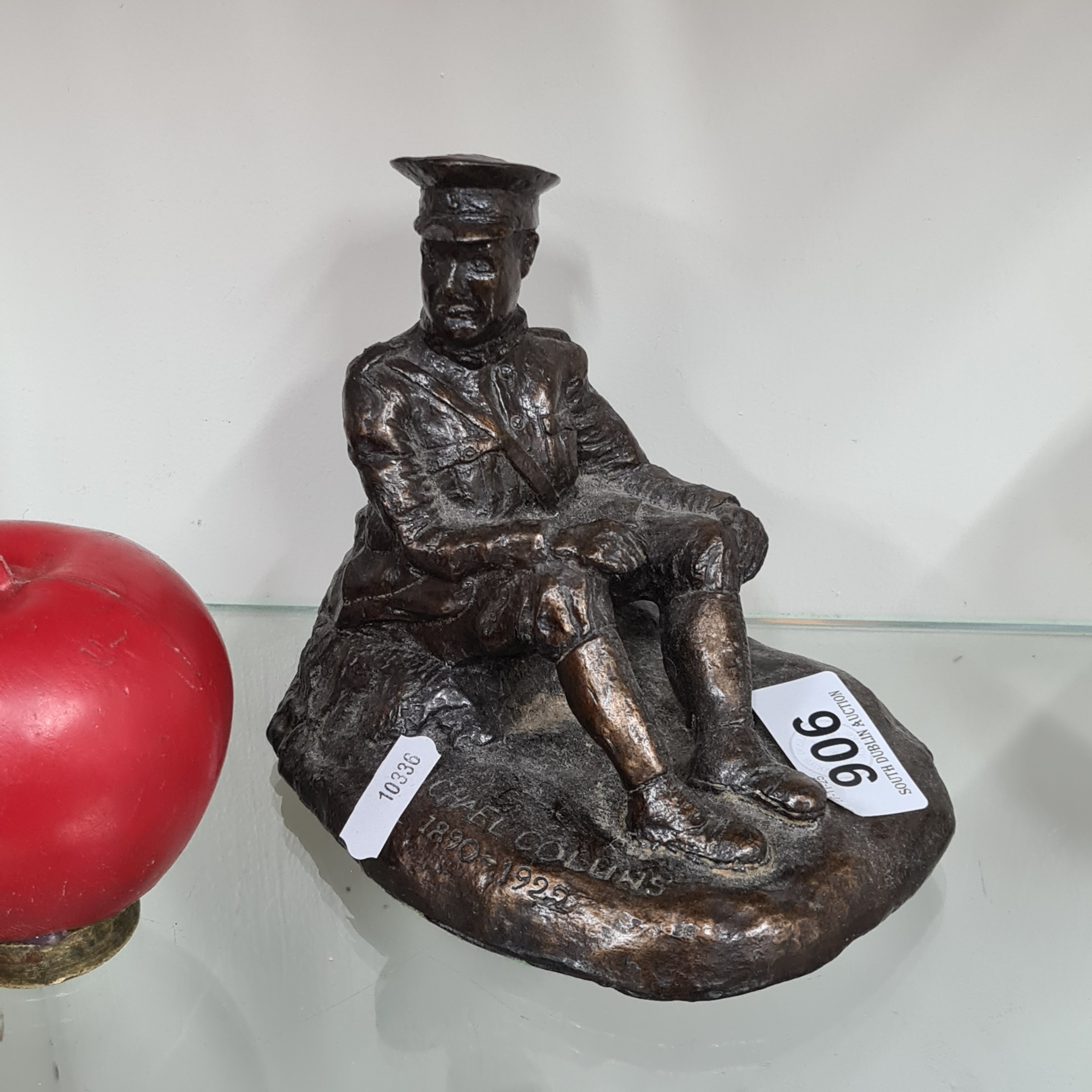 A detailed sculpture of Michael Collins, signed J. Gaynor.