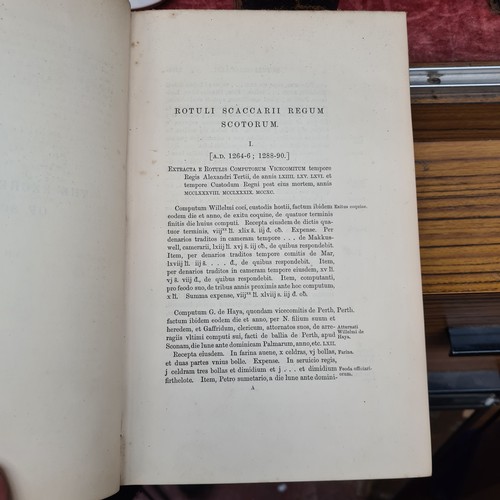 Four antique hardback volumes of the Exchequer Rolls of Scotland ...