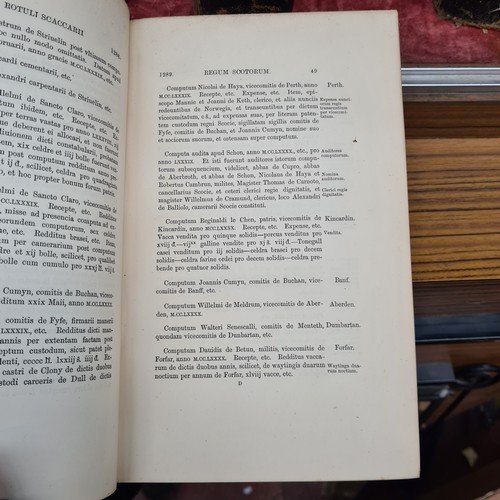 Four antique hardback volumes of the Exchequer Rolls of Scotland ...
