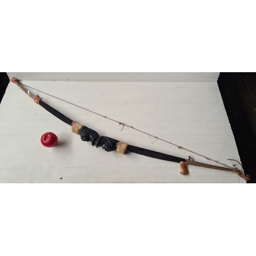 Decorative Full size African tribal bow, wooden stave with central ...