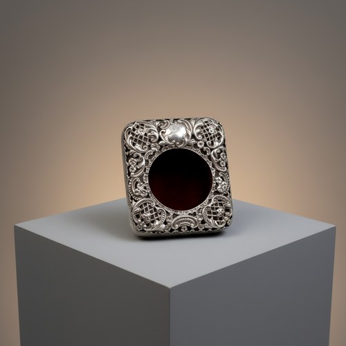 A Sterling Silver Goliath watch stand. Holds repousse design ...