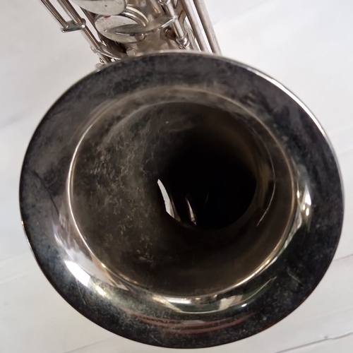 Silver-plated alto saxophone with white key touches and engraved bell ...