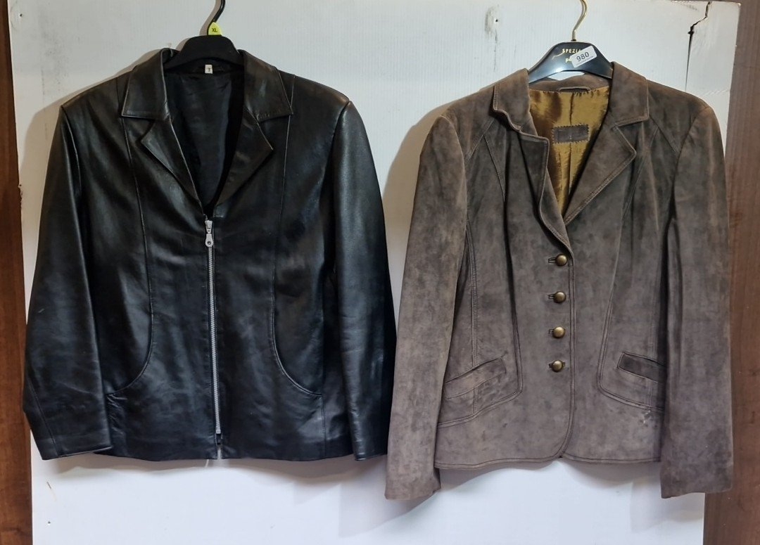 Pair of women’s leather jackets: one black smooth leather, zip-front ...