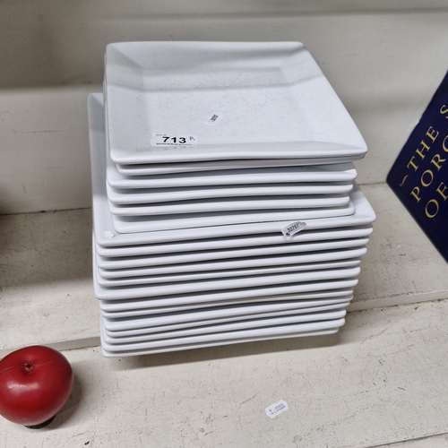 A selection of nineteen white ceramic serving plates including 6 side ...