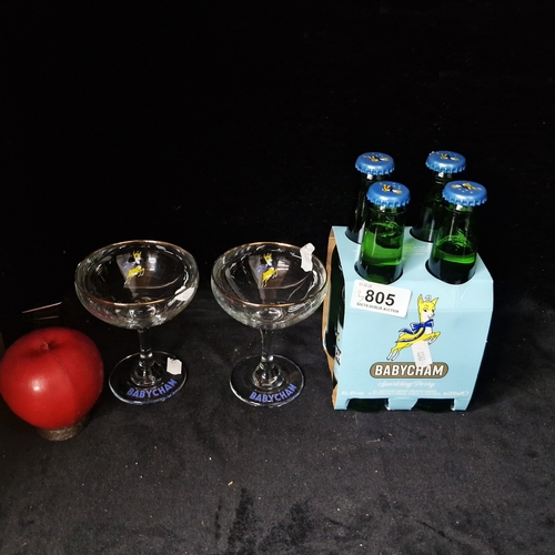 Four sealed bottles of Babycham sparkling perry, along with a pair of ...