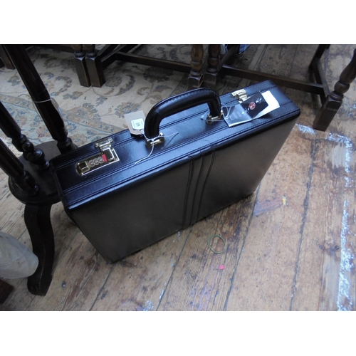 Unused black leather combination lock briefcase