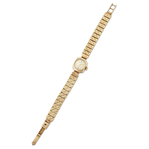 A LADY'S 9 CARAT GOLD NETEX BRACELET WATCH the circular champagne dial ...