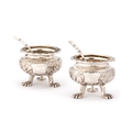 A PAIR OF CHINESE EXPORT SILVER SALTS each with the mark of Wang Hing ...