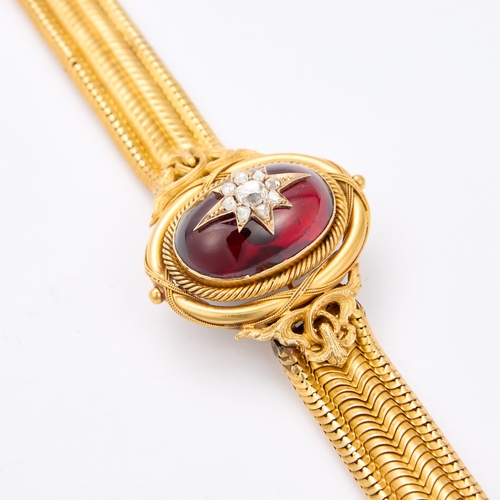 A VICTORIAN CARBUNCLE GARNET AND DIAMOND BRACELET an oval carbuncle ...