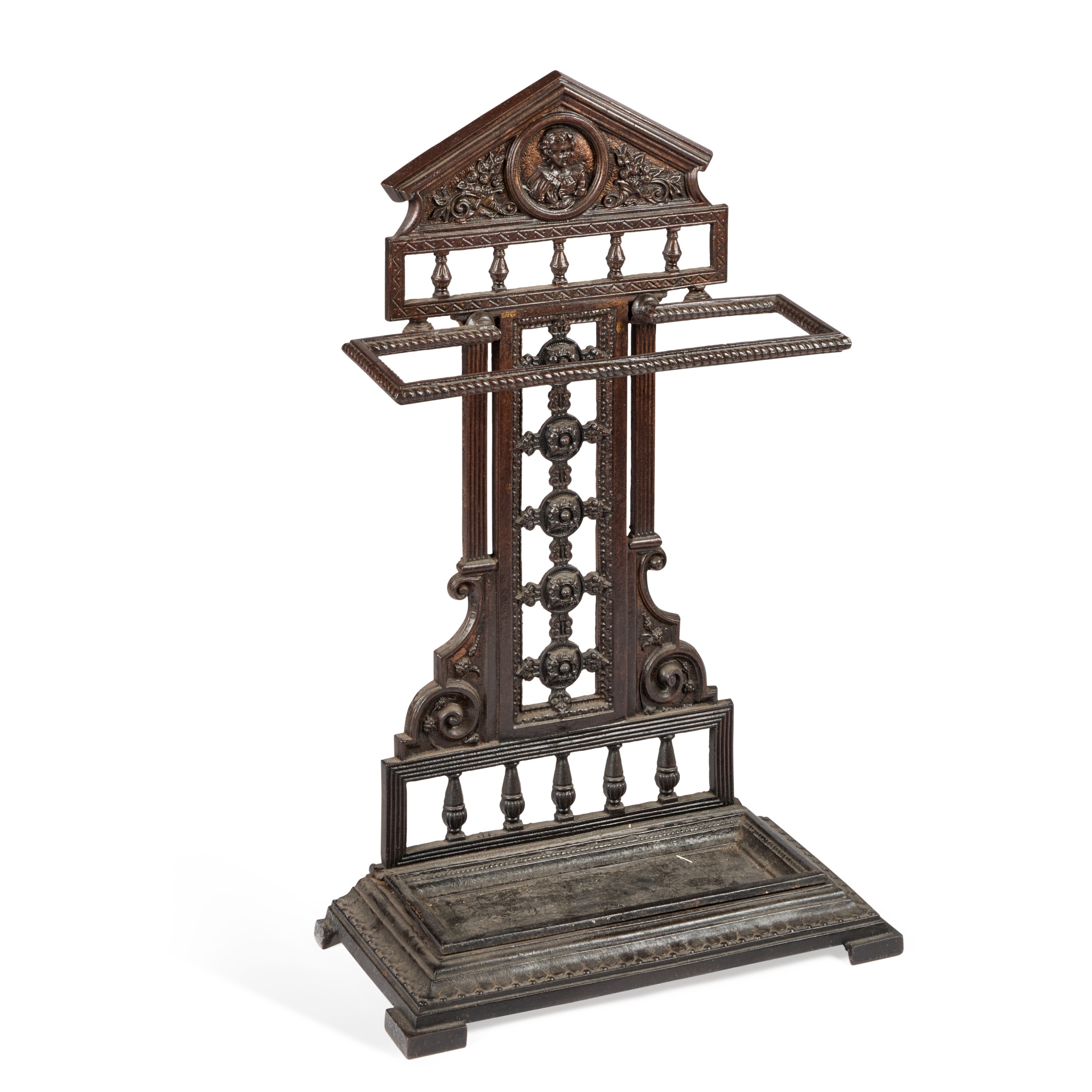 A VICTORIAN CAST IRON STICKSTAND with a pointed arch pediment and ...