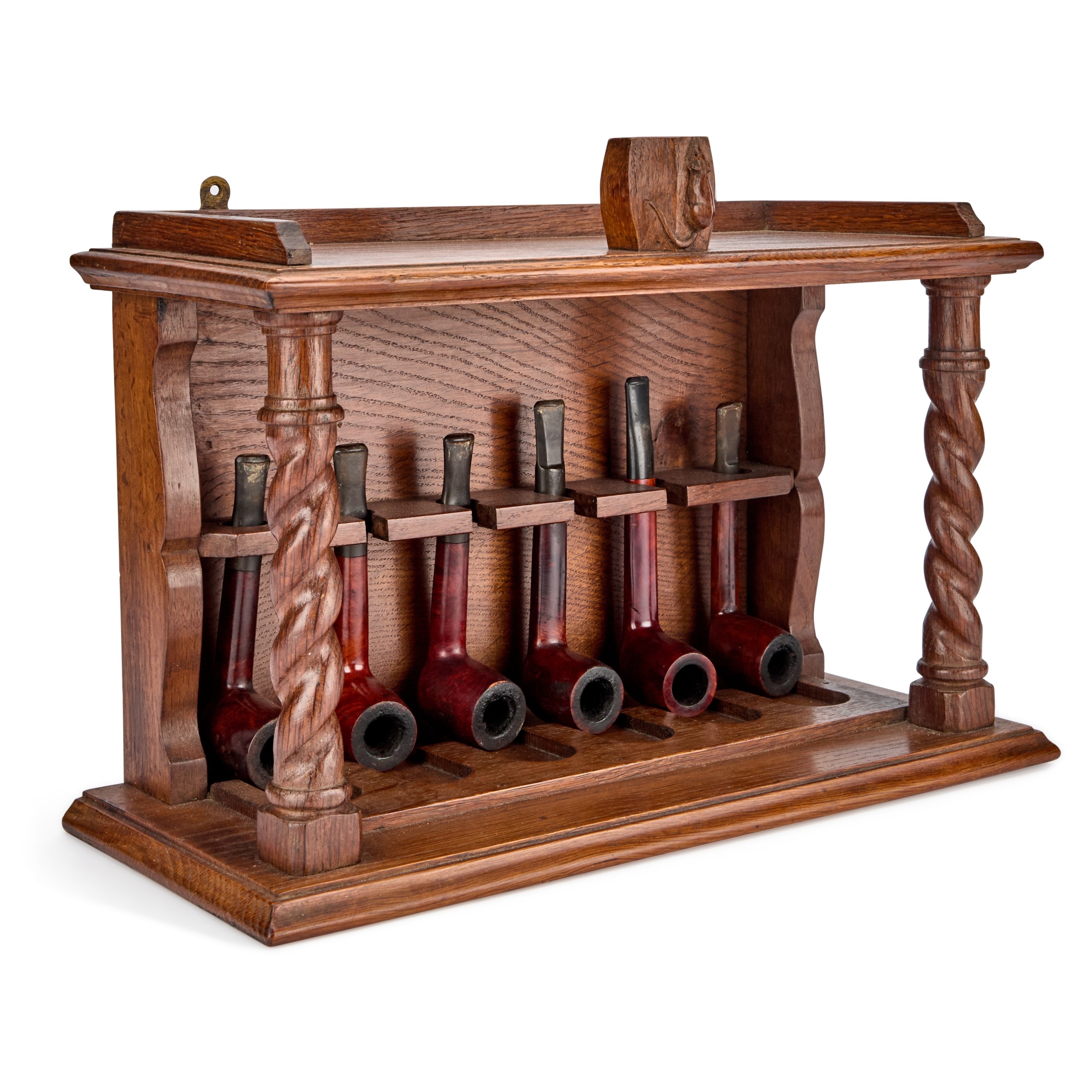 ROBERT THOMPSON OF KILBURN A MOUSEMAN OAK PIPE RACK, CIRCA 1920-30 the ...