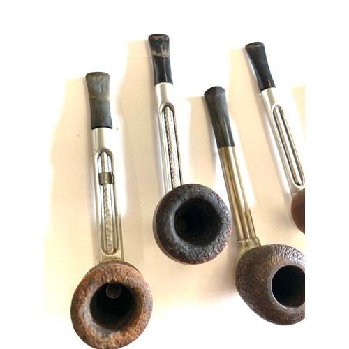 Six vintage aluminium smoking pipes by falcon, alco and Ronson