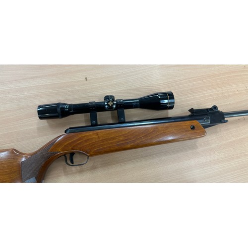 German Feinwerkbau air rifle with spotting scope